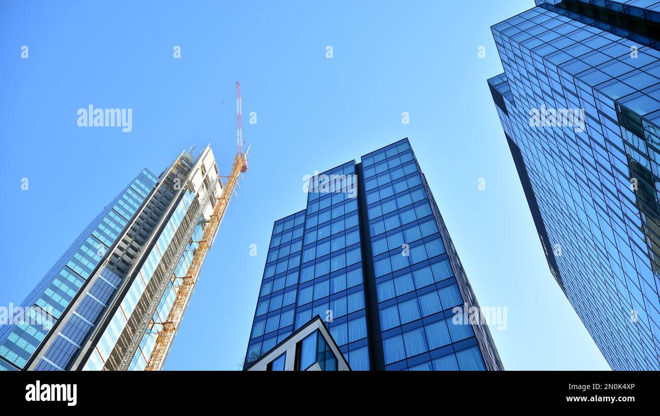 High-rise building under construction. Modern office building Stock ...