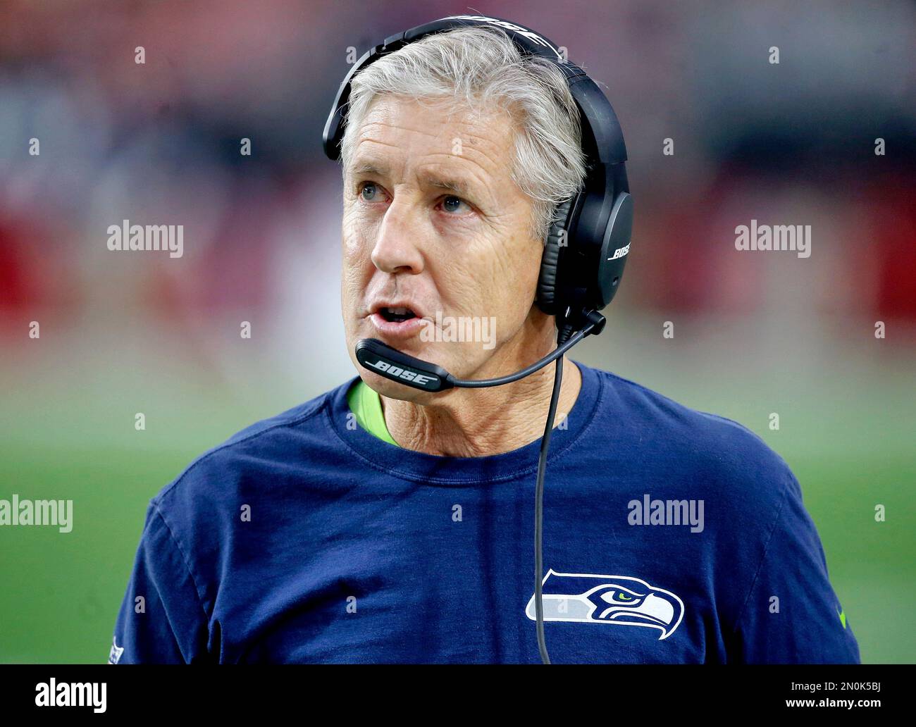 Seattle Seahawks head coach Pete Carroll makes a call during the first ...