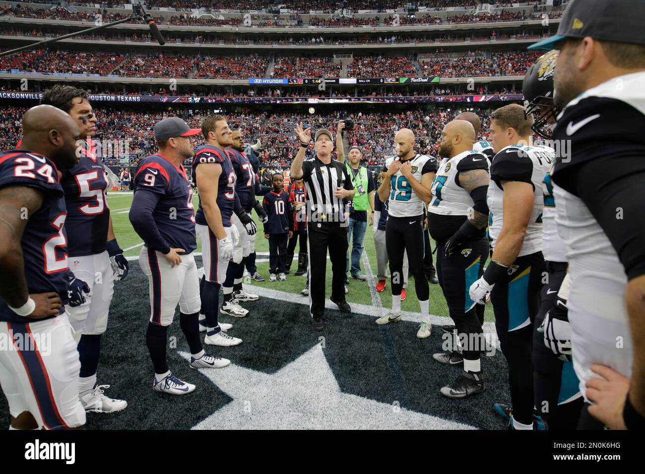 NFL Referee Terry McAulay conducts the coin toss before an NFL football ...