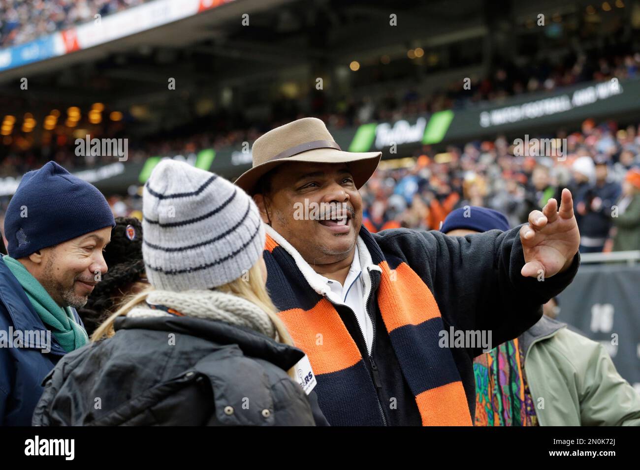 Former Chicago Bears player William Perry talks to a television ...
