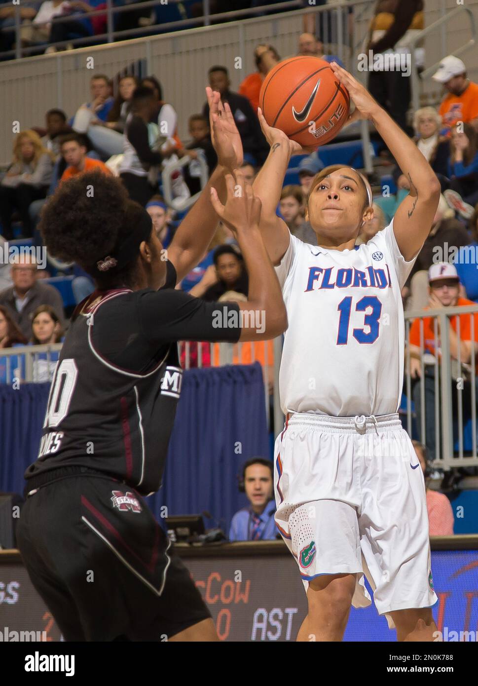 Florida guard Cassie Peoples (13) shoots over Mississippi State guard ...