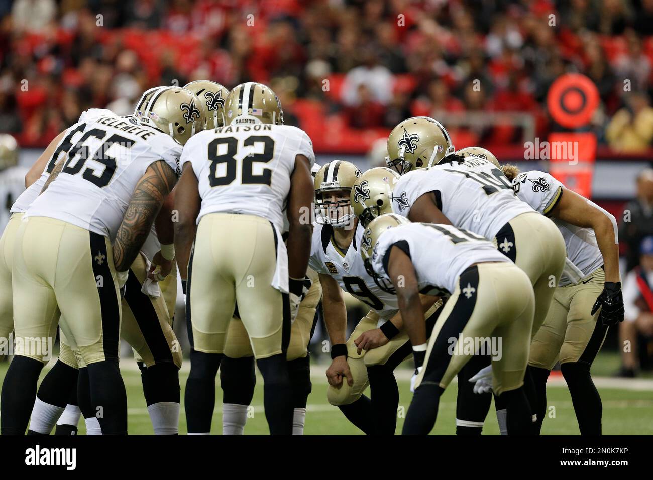 New Orleans Saints quarterback Drew Brees (9) calls a play in huddle ...