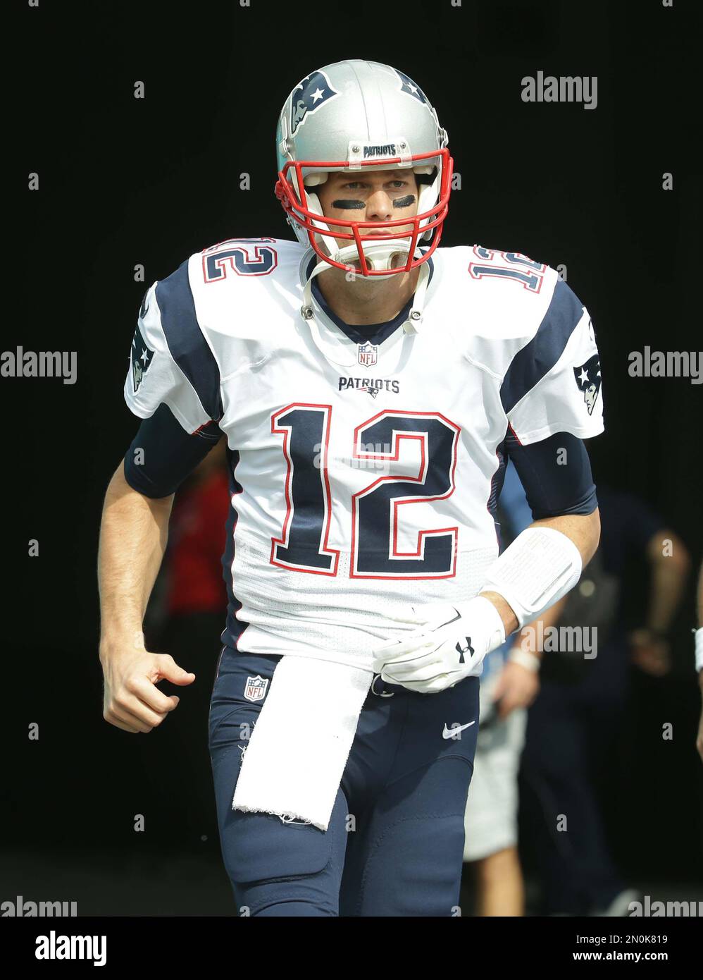 New England Patriots quarterback Tom Brady (12) enters the field before ...