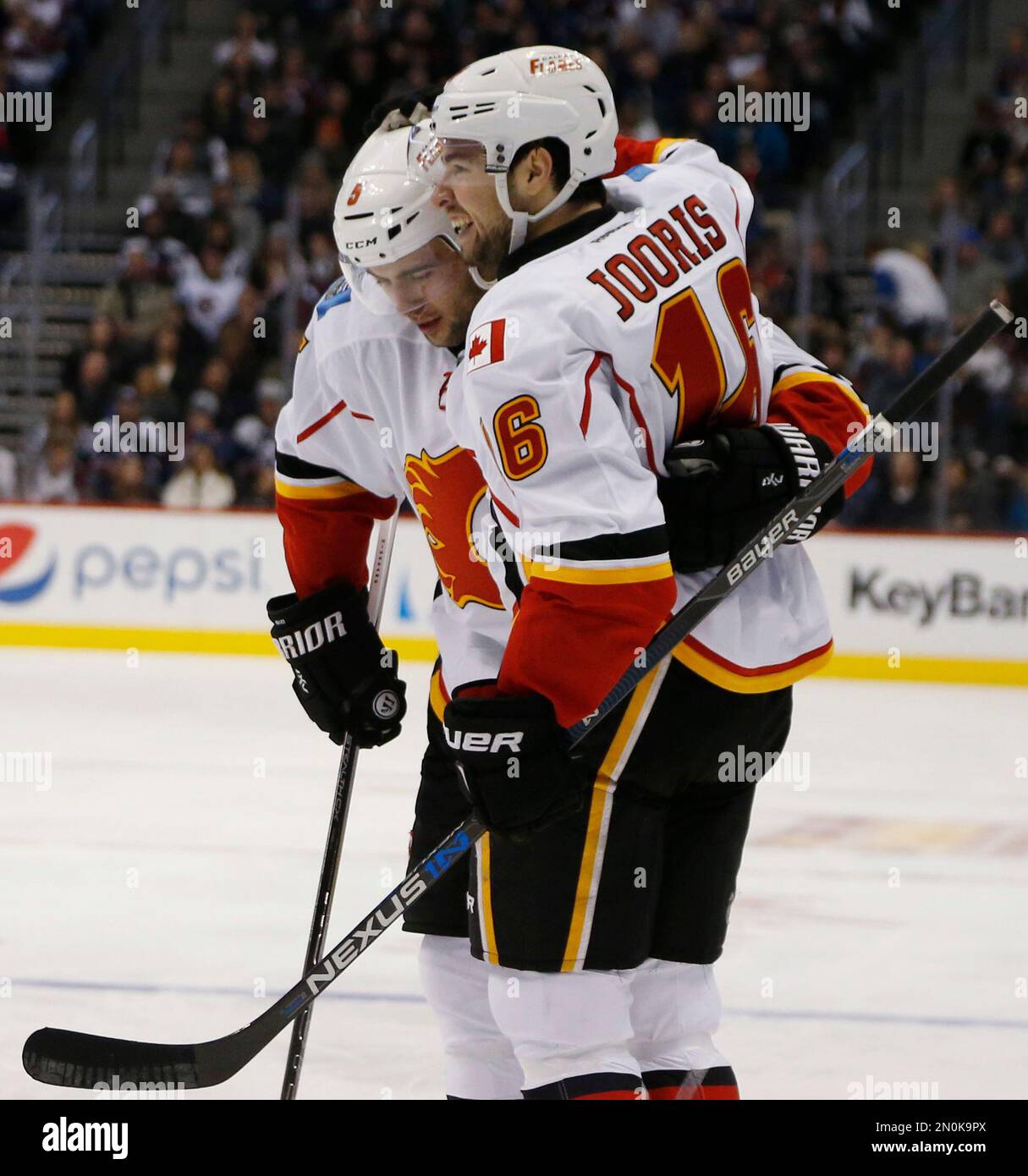 Calgary Flames center Josh Jooris, front, celebrates his goal with ...