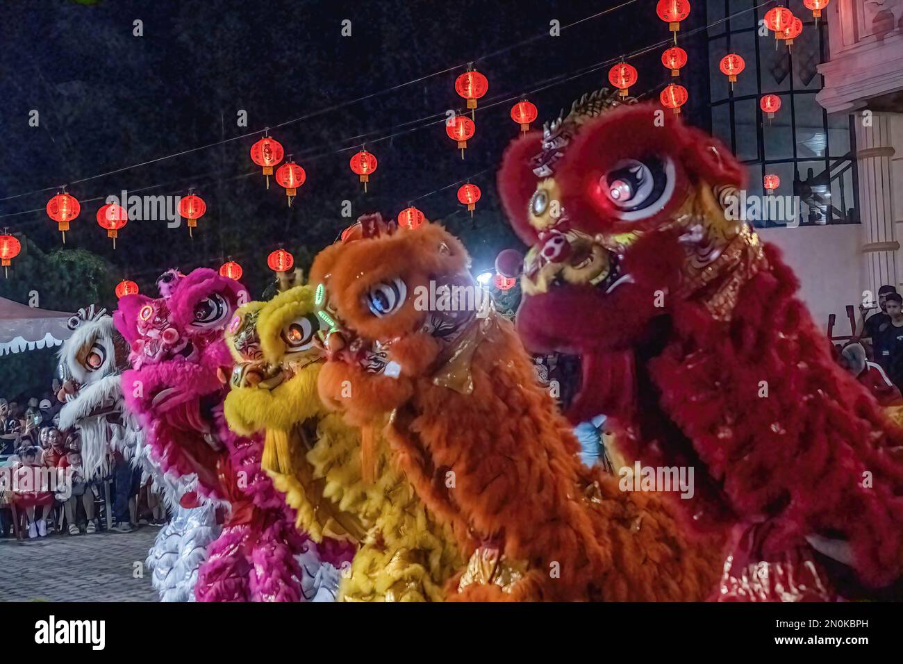 Artists seen performing the traditional lion dance during the 2023 Cap ...