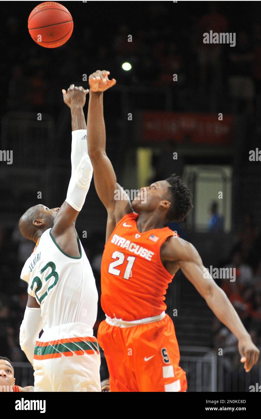 Miami center Tonye Jekiri, left, and Syracuse forward Tyler Roberson ...