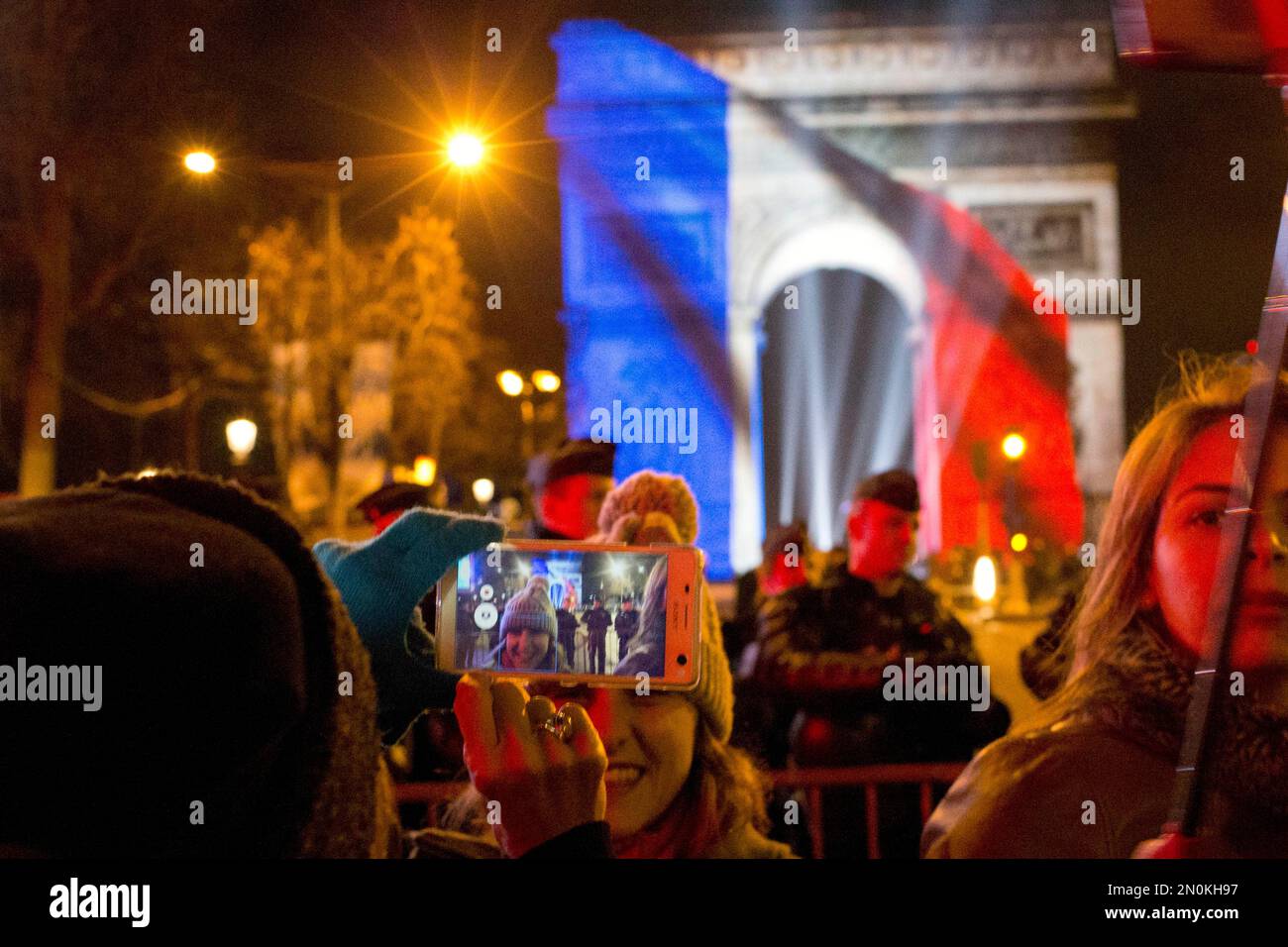 Revellers take souvenir selfies at the end of the 5-minute video ...