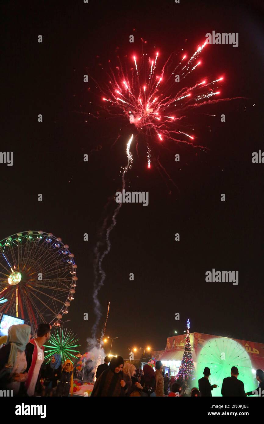 Fireworks light up the sky as Iraqis welcome the New Year during the ...