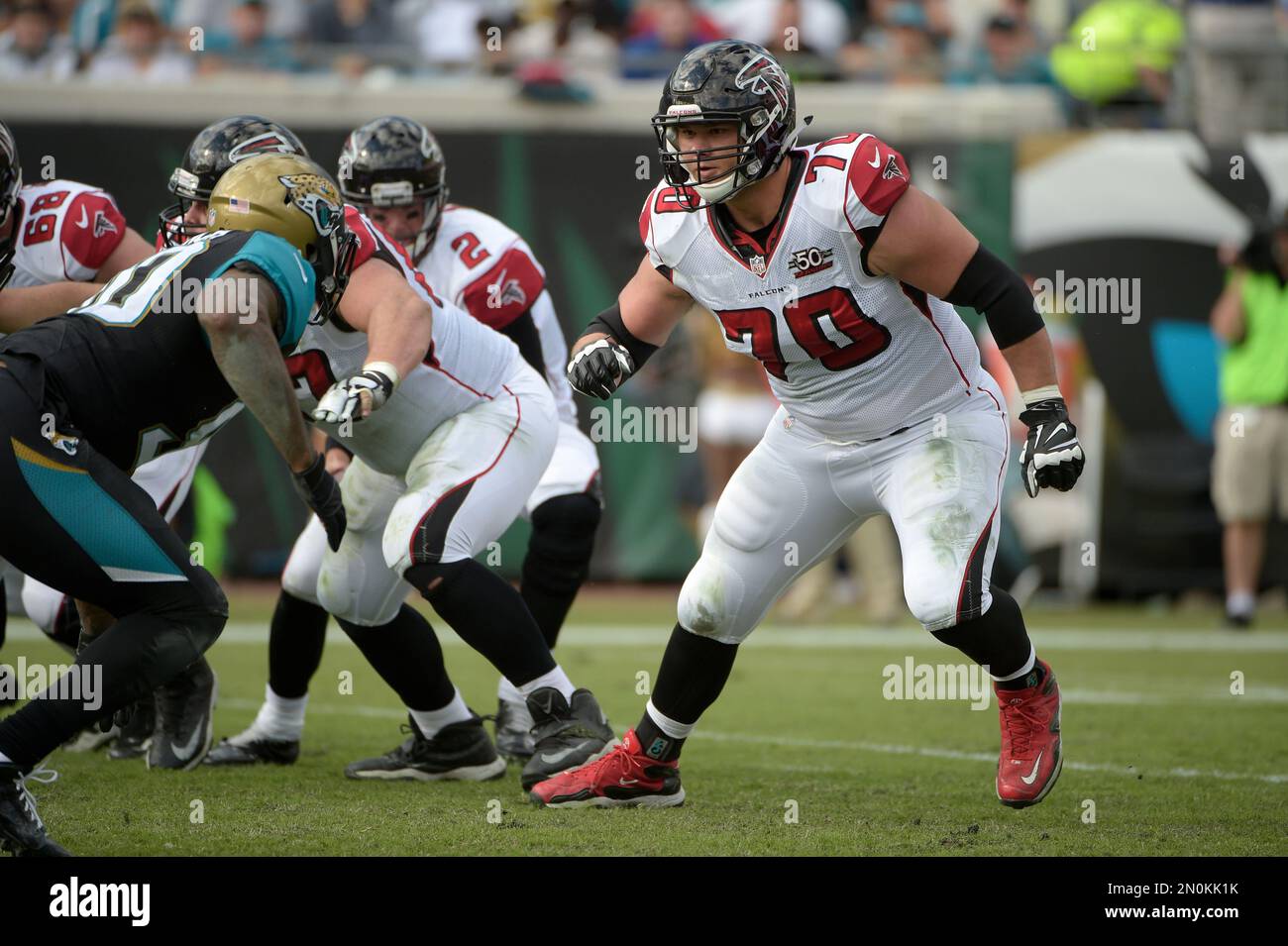 Atlanta Falcons tackle Jake Matthews (70) sets up to block against ...
