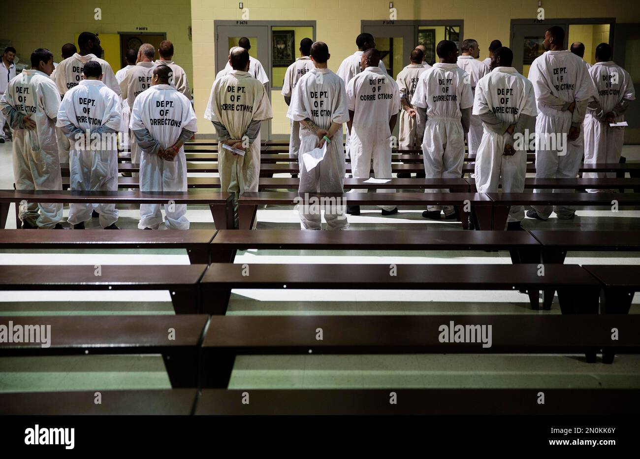 Prisoners stand while being processed for intake at the Georgia ...