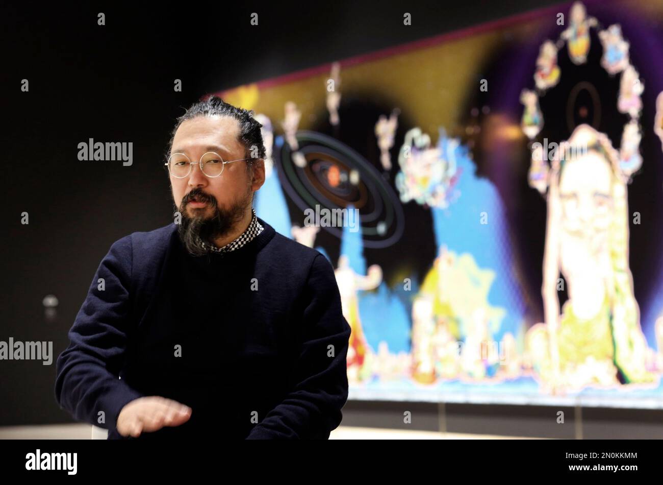 In this Dec. 29, 2015 photo, Japanese artist Takashi Murakami speaks in ...