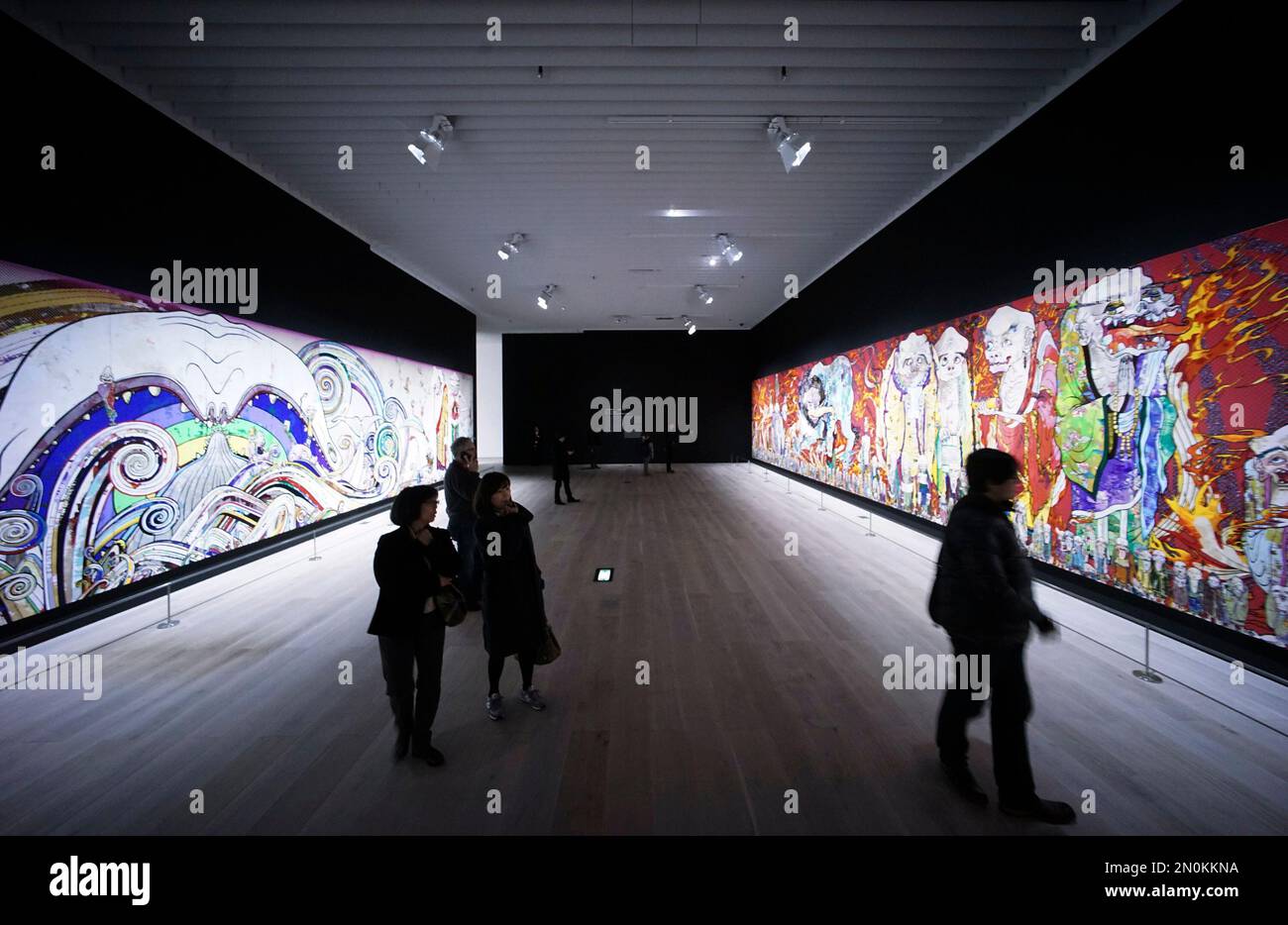 In this Dec. 29, 2015 photo, visitors look at Japanese artist Takashi ...