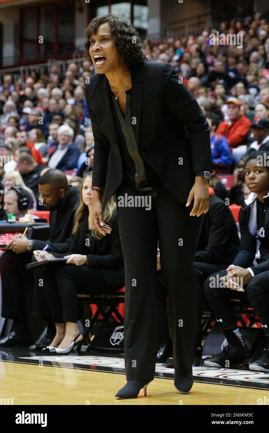 Cincinnati head coach Jamelle Elliott works the bench in the first half ...