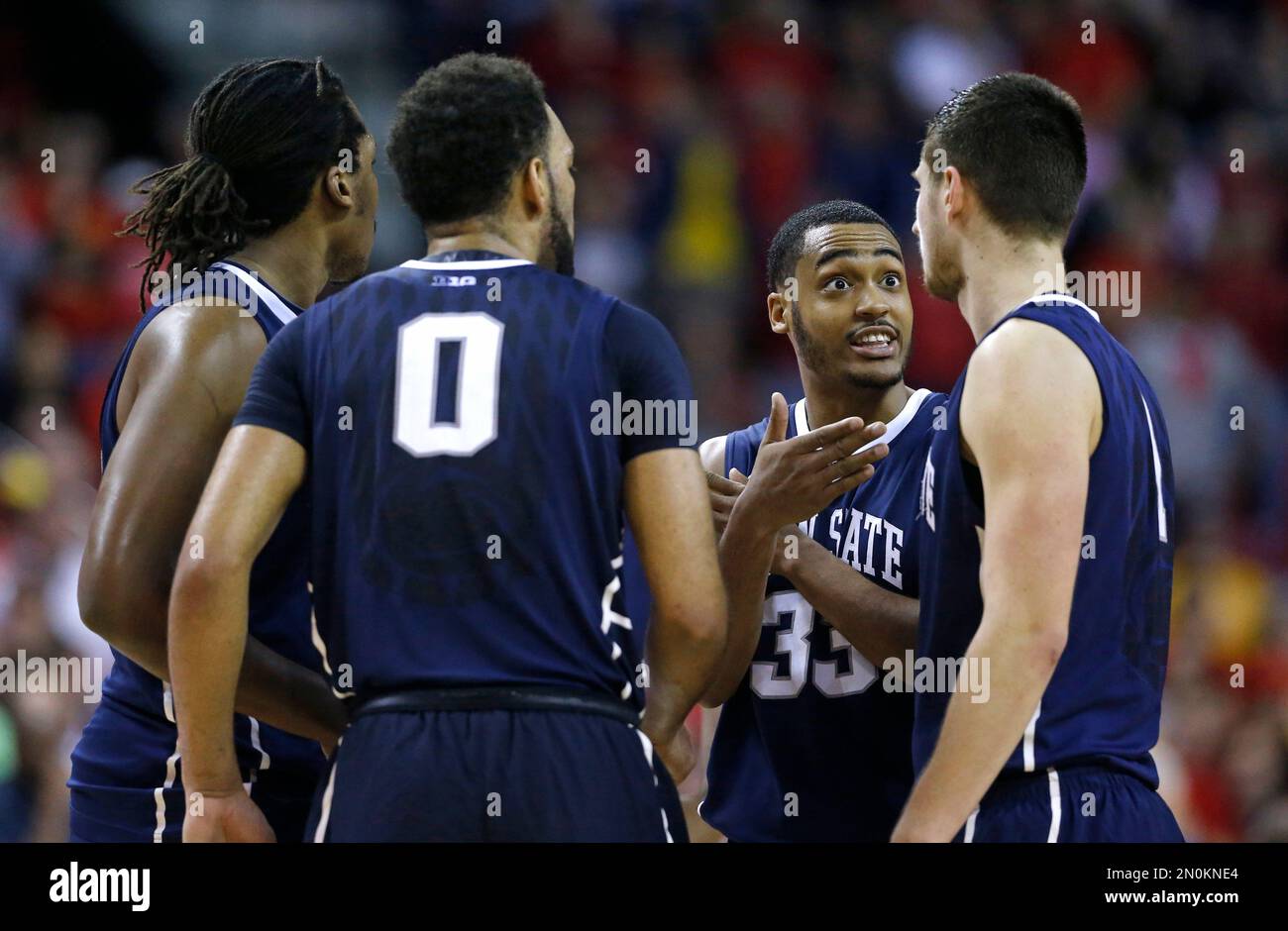 Penn State guard Shep Garner, second from right, speaks with teammates ...