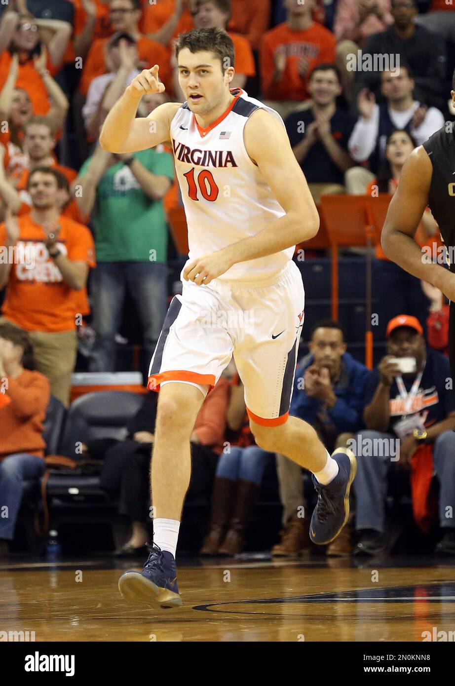 Virginia center Mike Tobey (10) reacts after making a basket during an ...