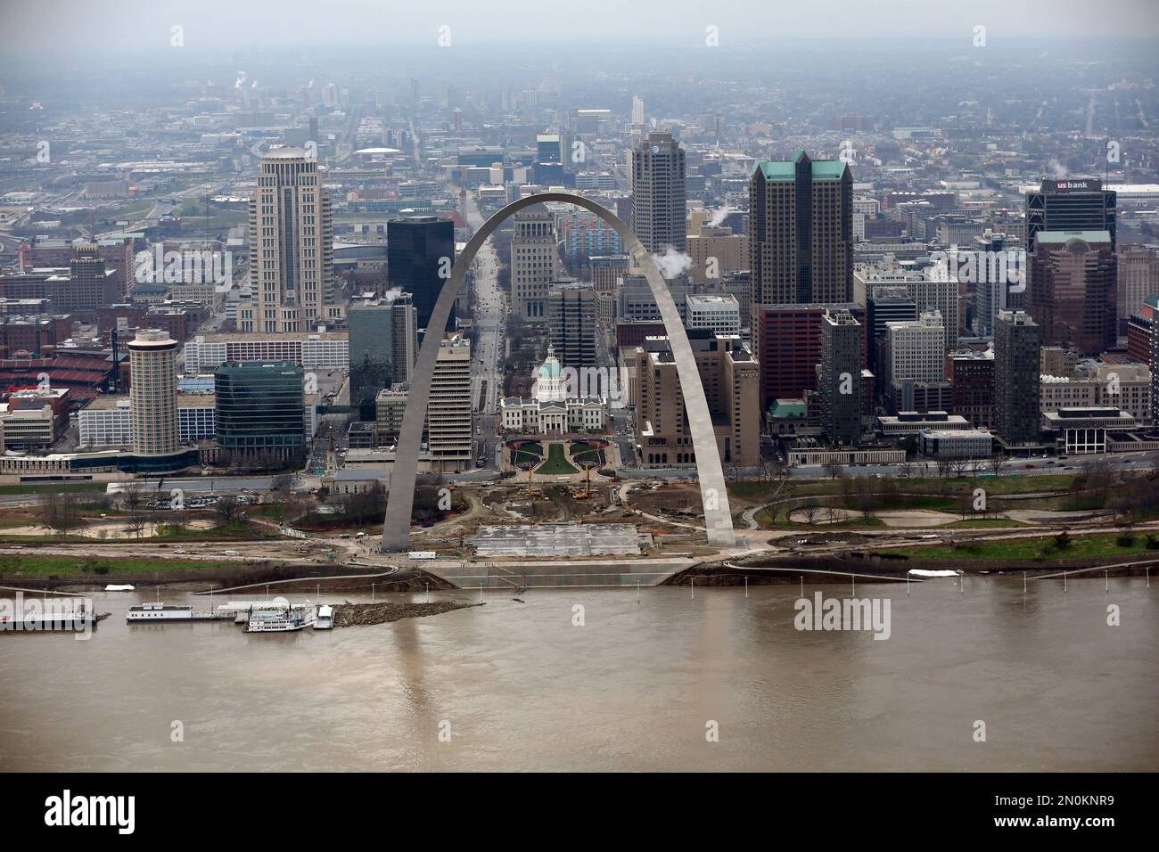 In this aerial photo, the Mississippi River flows past the Gateway Arch ...