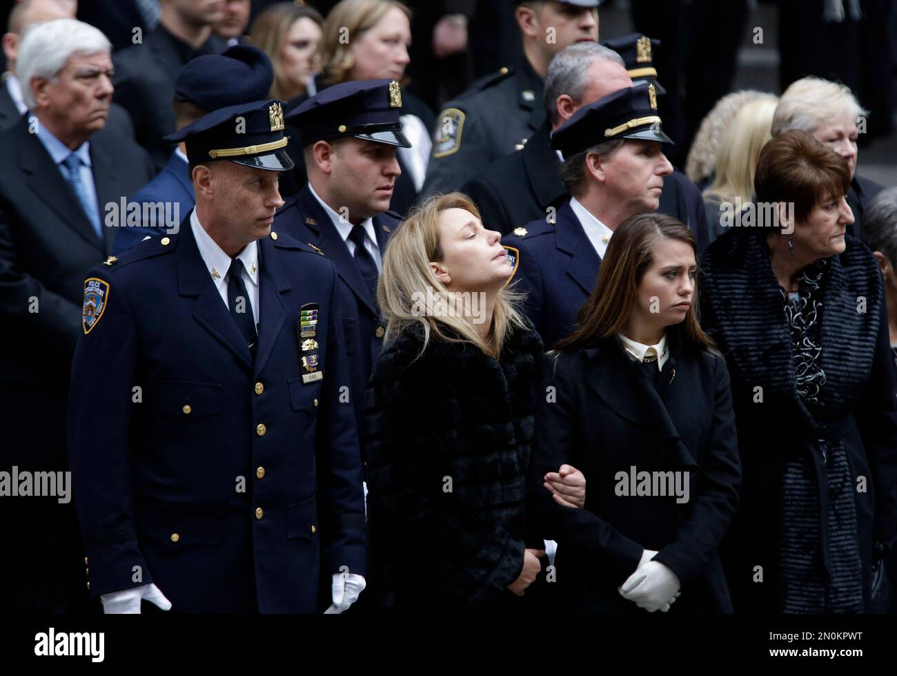 Christine Lemm, center, wife of Joseph Lemm, reacts as her husband's ...