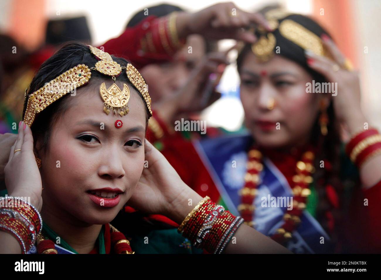 Nepalese Gurung community women wearing traditional attire get ready to ...