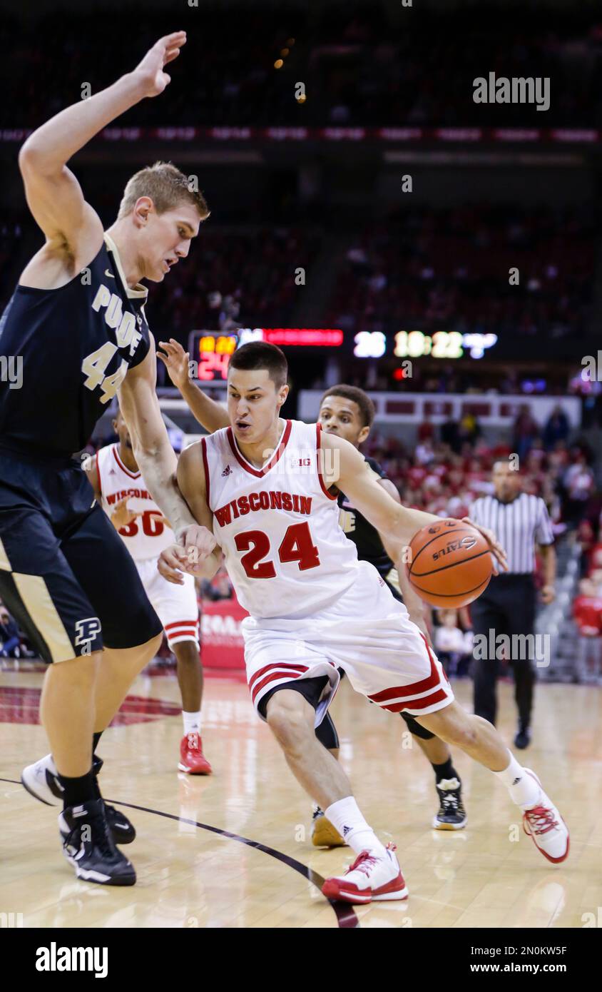 Wisconsin's Bronson Koenig (24) drives on Purdue's Isaac Haas (44 ...