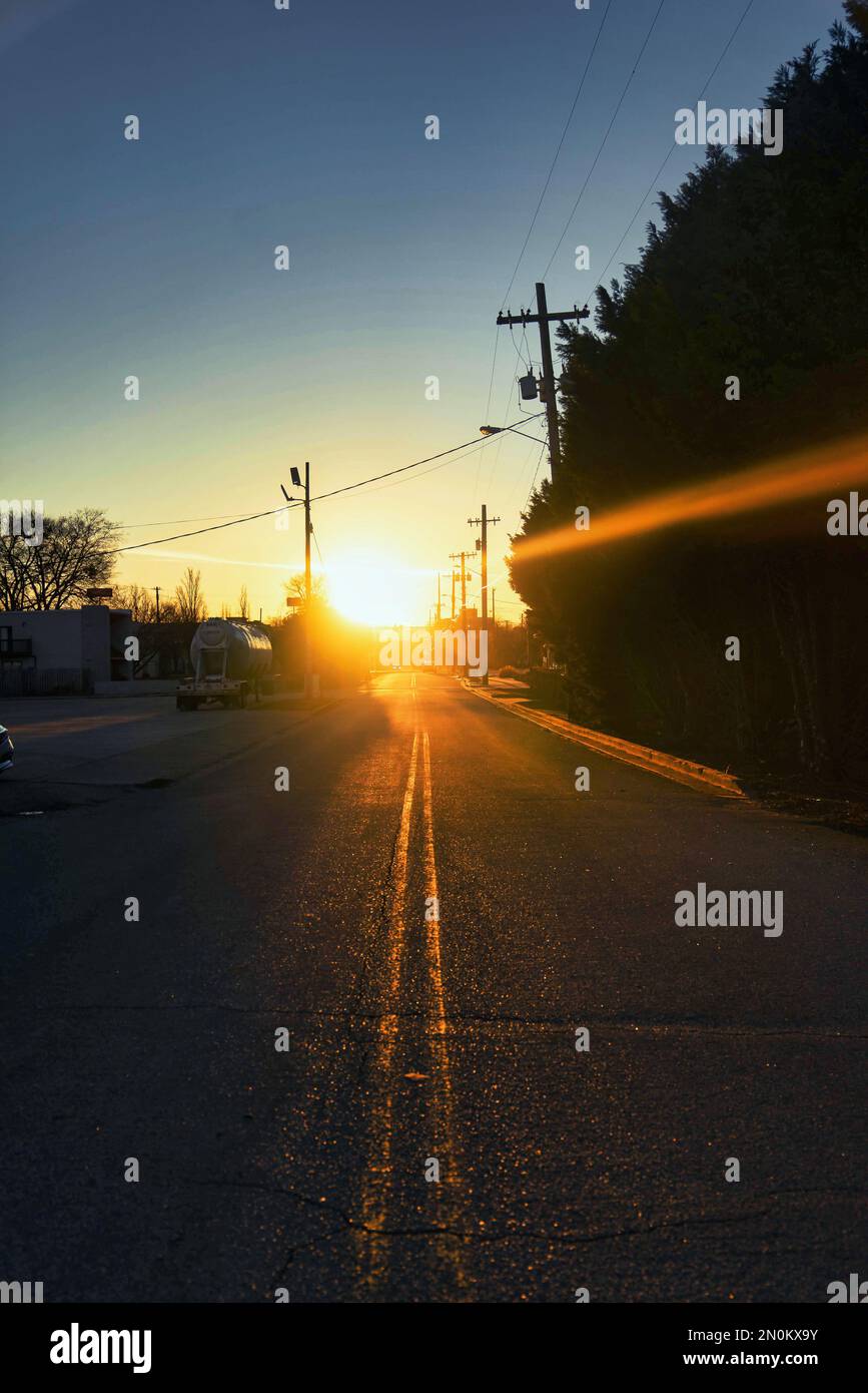 Sunrise on beautiful city road Stock Photo - Alamy