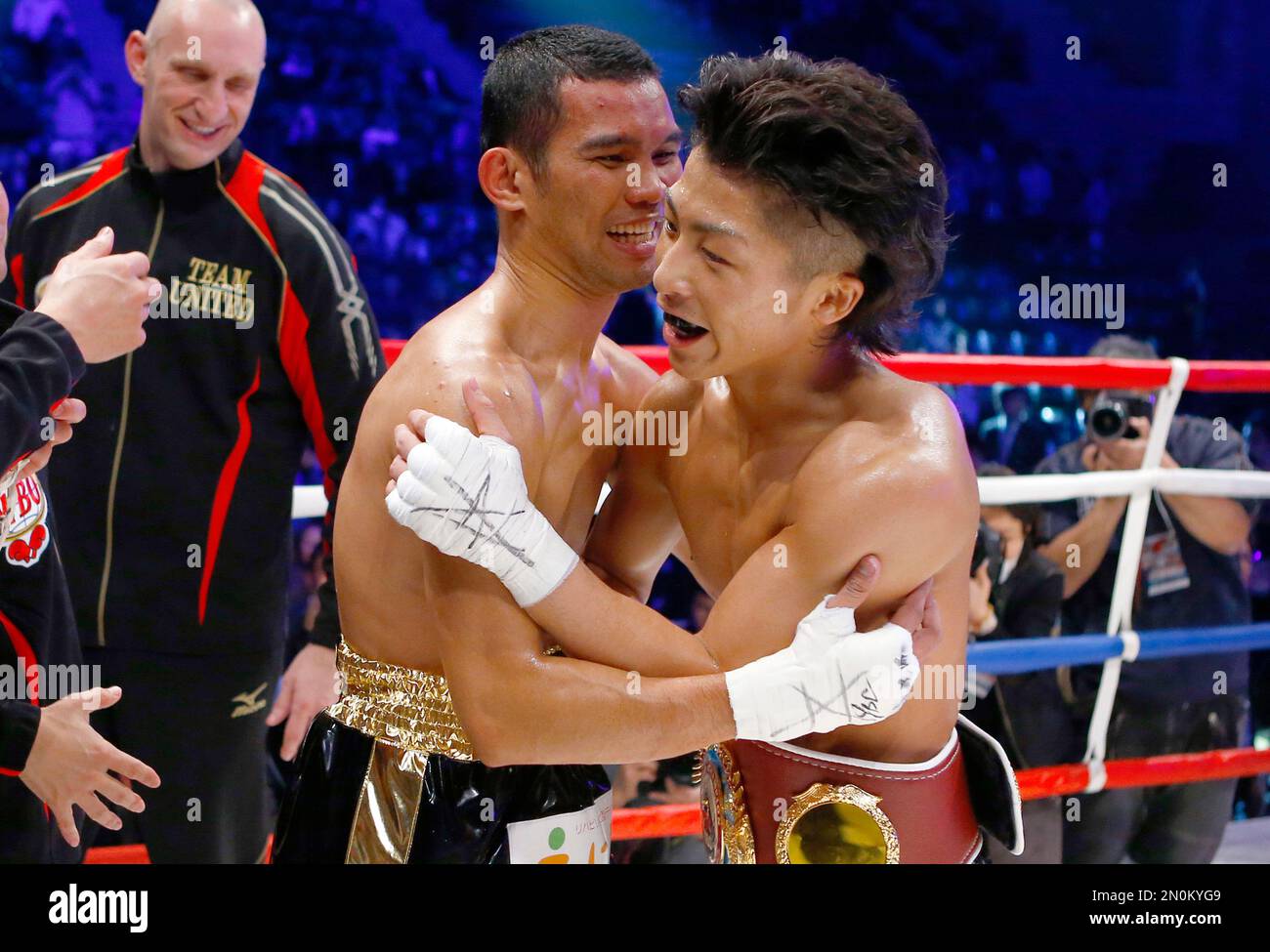Champion Naoya Inoue, right, of Japan is greeted by challenger Warlito Parrenas of Philippine ...
