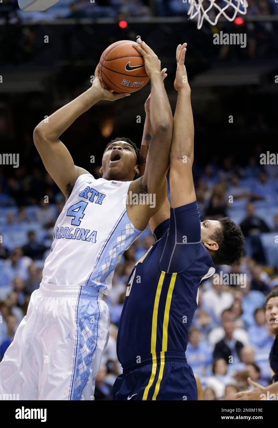 North Carolina's Isaiah Hicks (4) shoots against UNC Greensboro during ...