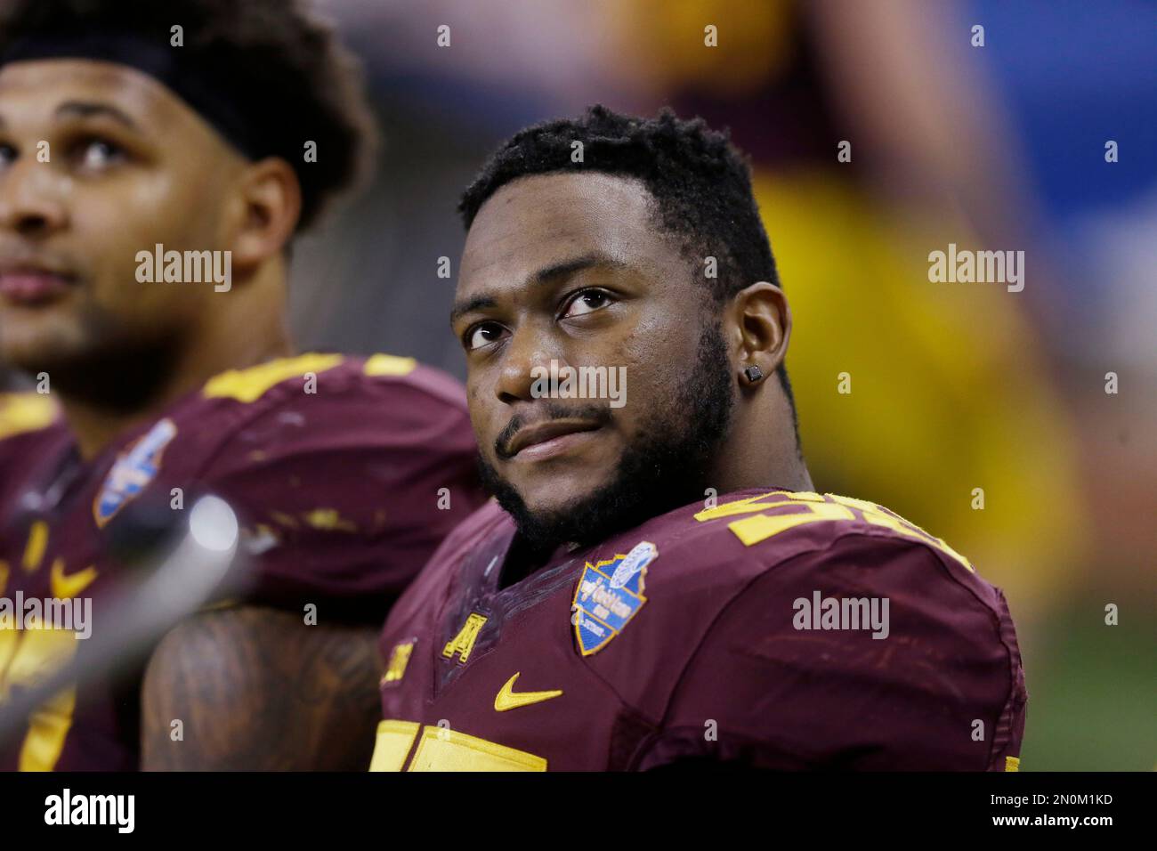 Minnesota defensive lineman Theiren Cockran looks towards the ...
