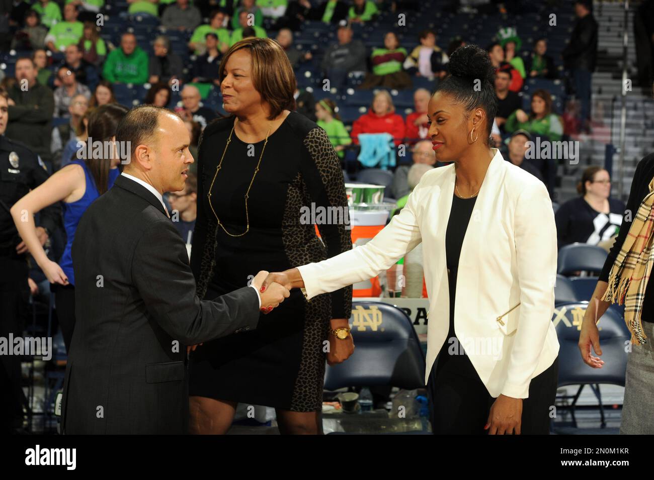 Oregon State coach Scott Rueck shakes hands with Notre Dame assistant ...