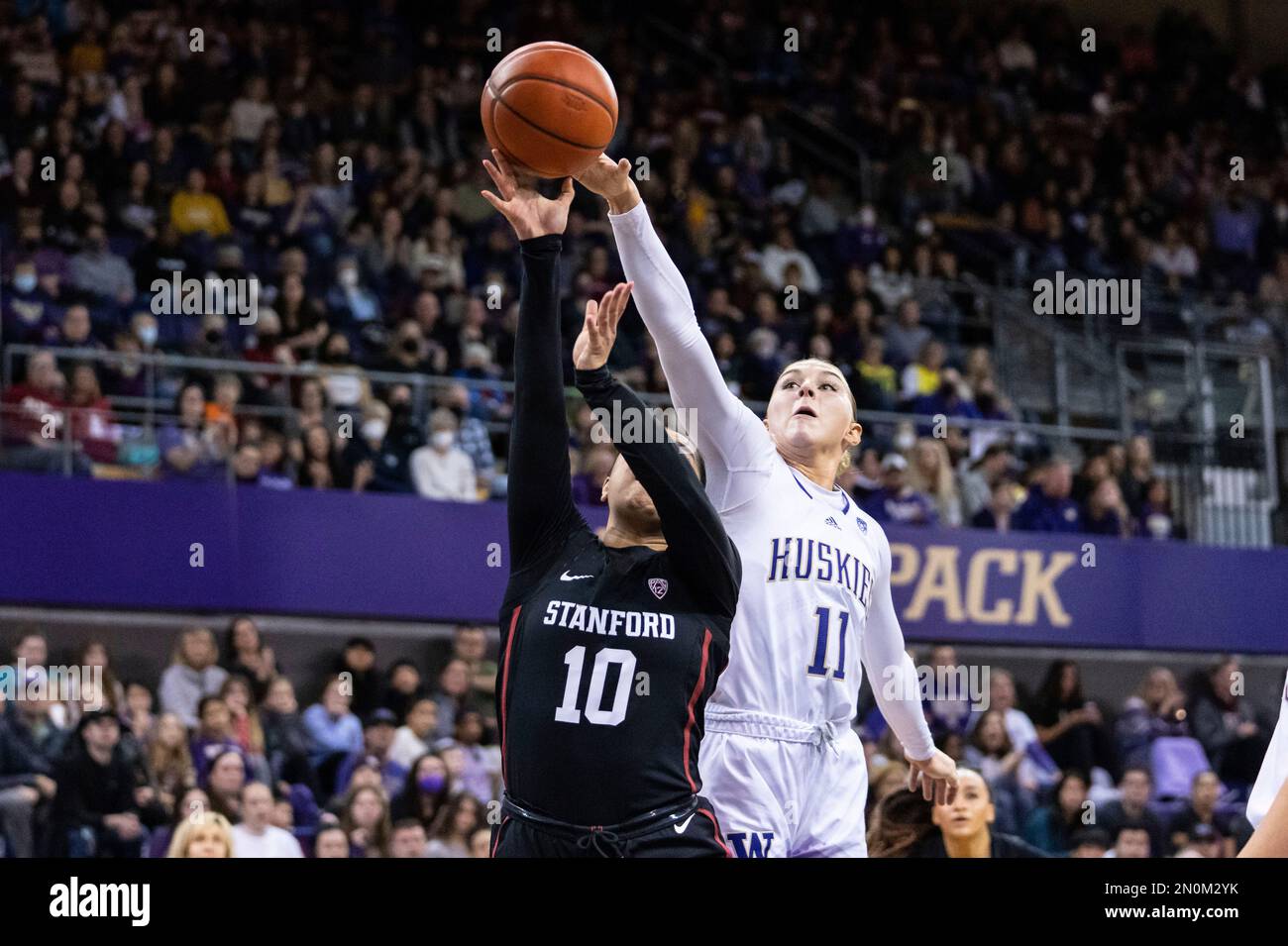 Washington forward Haley Van Dyke, right, blocks a shot by Stanford ...