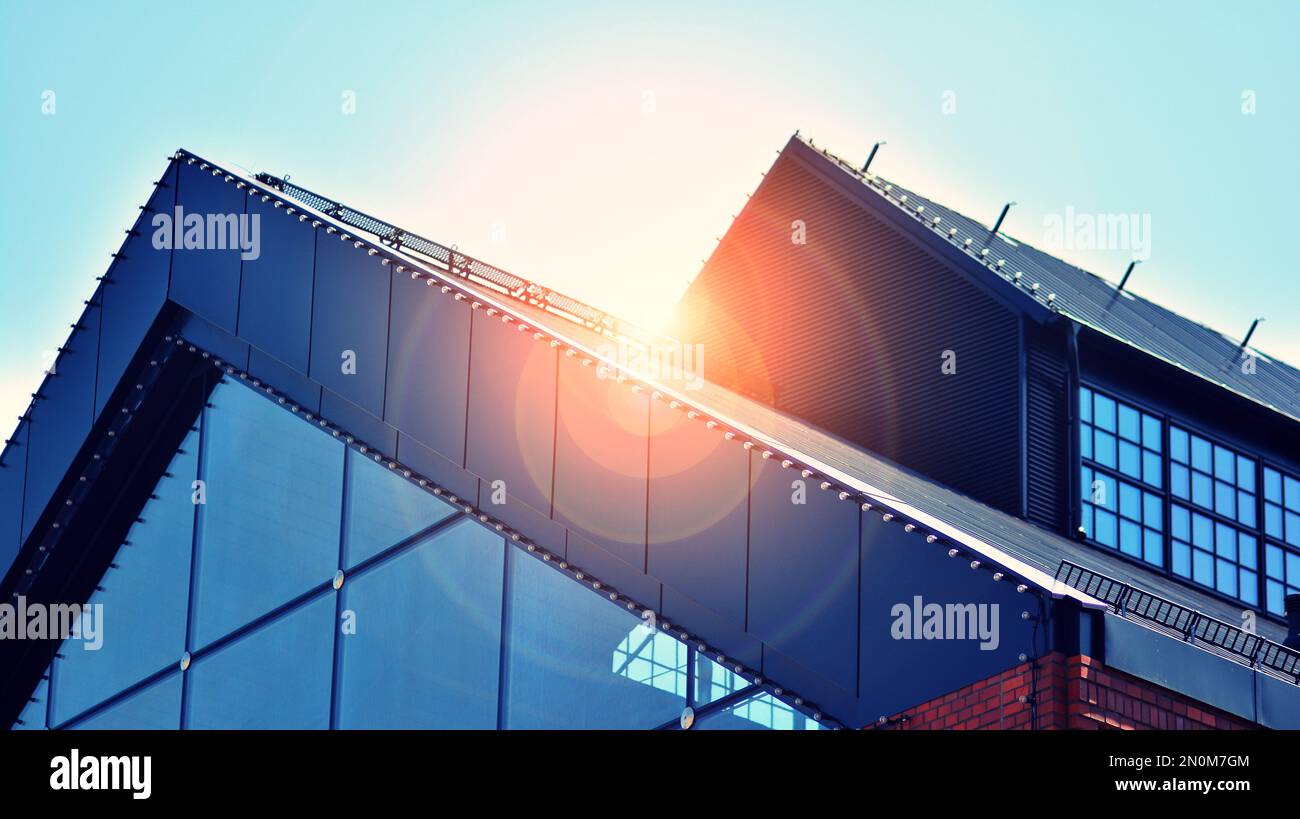 Modern building in the city with sunlight. Abstract texture and blue ...