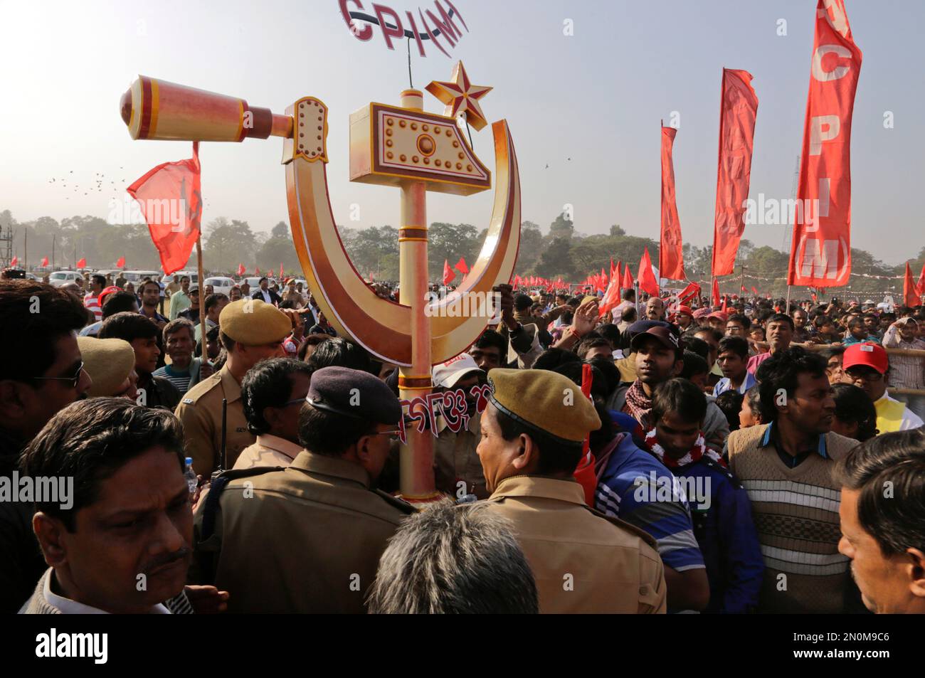 Cadres of Communist Party of India-Marxist carry a huge replica of ...