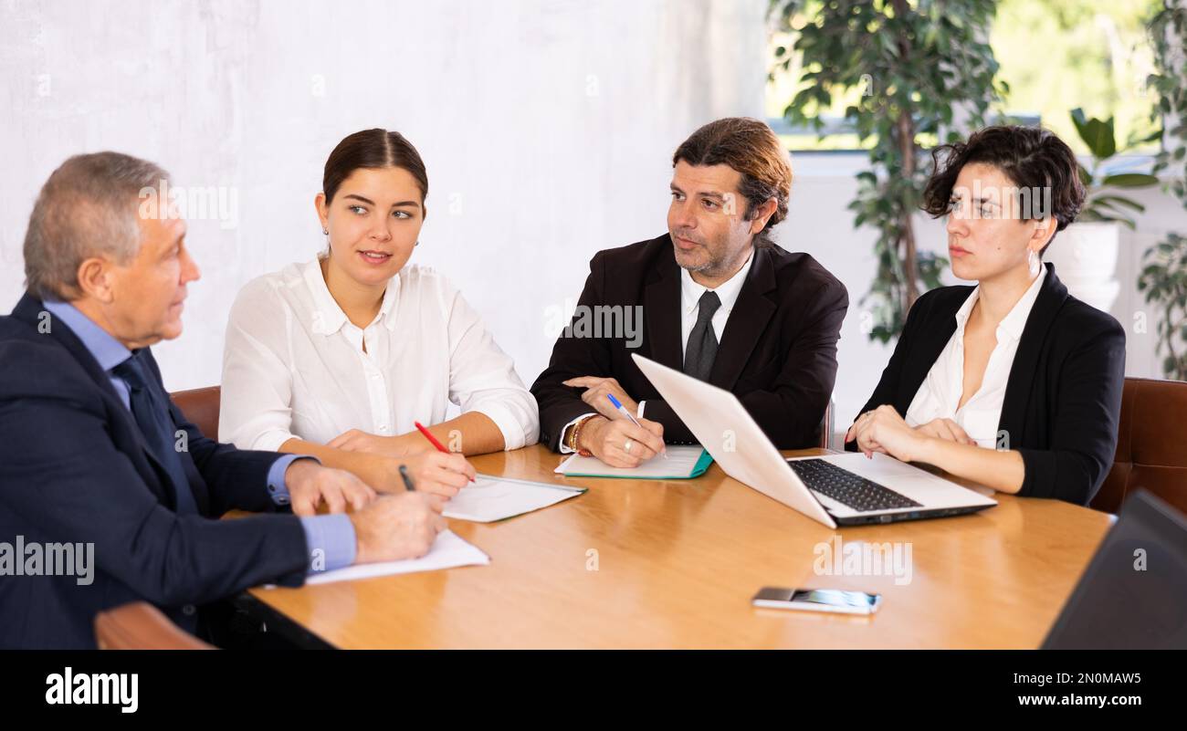 Meeting of top managers in meeting room in modern office Stock Photo ...