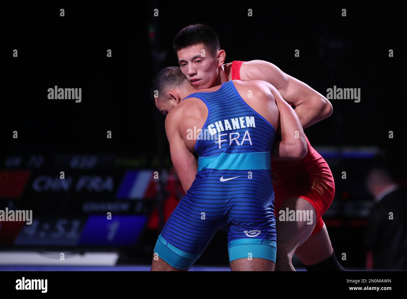 ZAGREB, CROATIA - FEBRUARY 05: Jian Tan of China (red) competes against ...