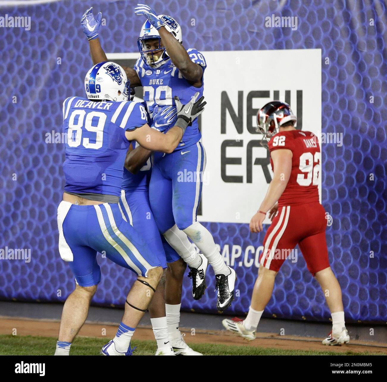 Duke's Shaun Wilson, second from right, and Indiana's Griffin Oakes ...