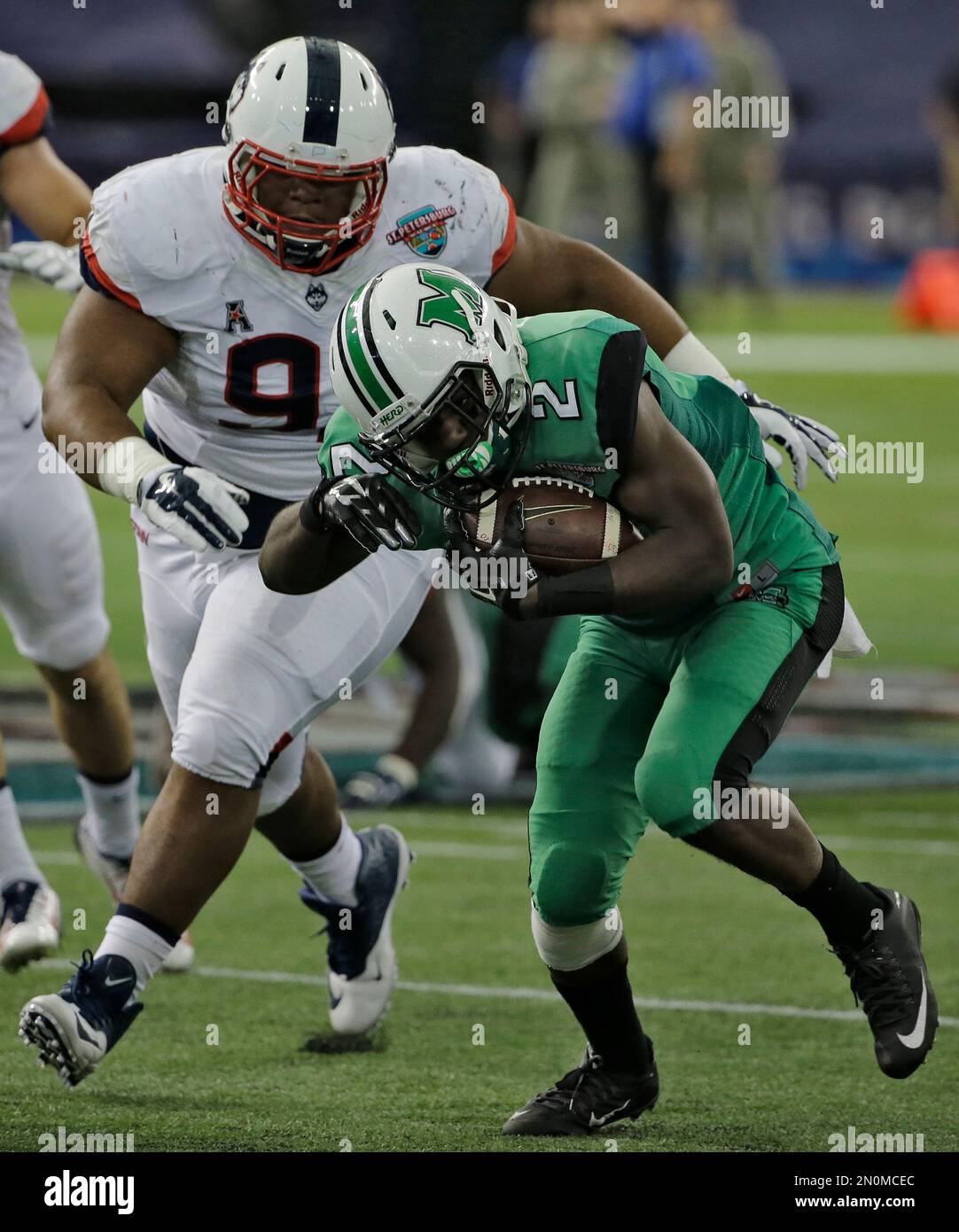 Marshall wide receiver Hyleck Foster (2) cuts in front of Connecticut ...