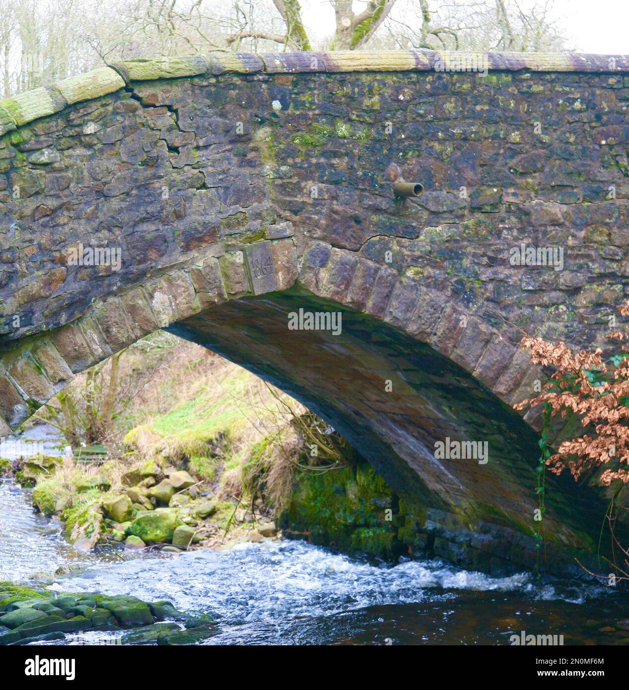 A crumbling bridge over the river, Barley, Lancashire, United Kingdom ...