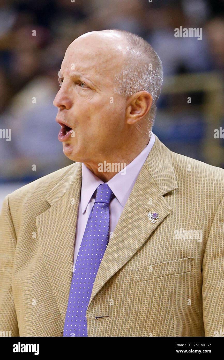 Western Carolina head coach Larry Hunter talks to his team in an NCAA ...