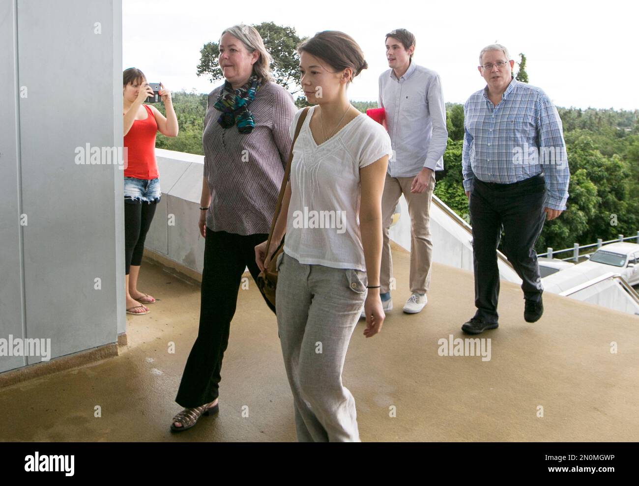 Sue Miller, second left, Ian Miller, right, and Michael Miller, second ...