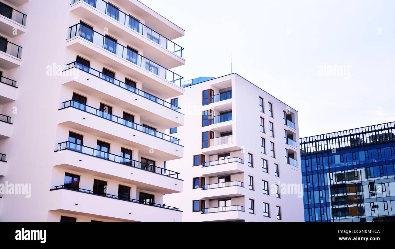 Condominium and apartment building with symmetrical modern architecture ...