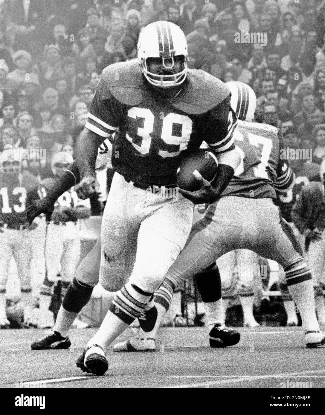 FILE - In this Jan. 13, 1974, file photo, Larry Csonka runs the ball ...