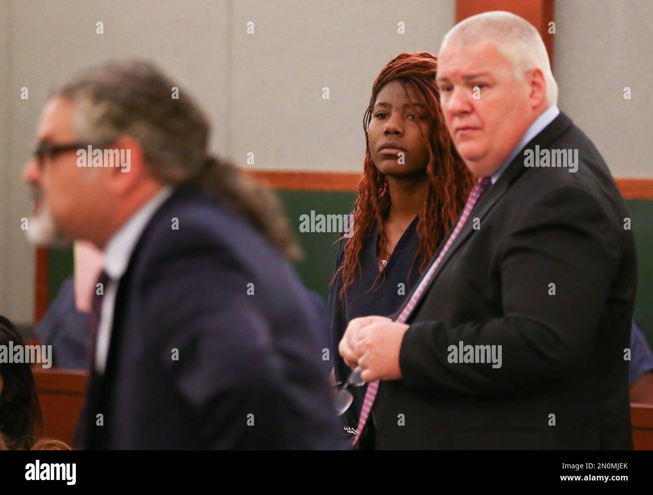 Lakeisha Nicole Holloway, center, appears with her public defenders ...