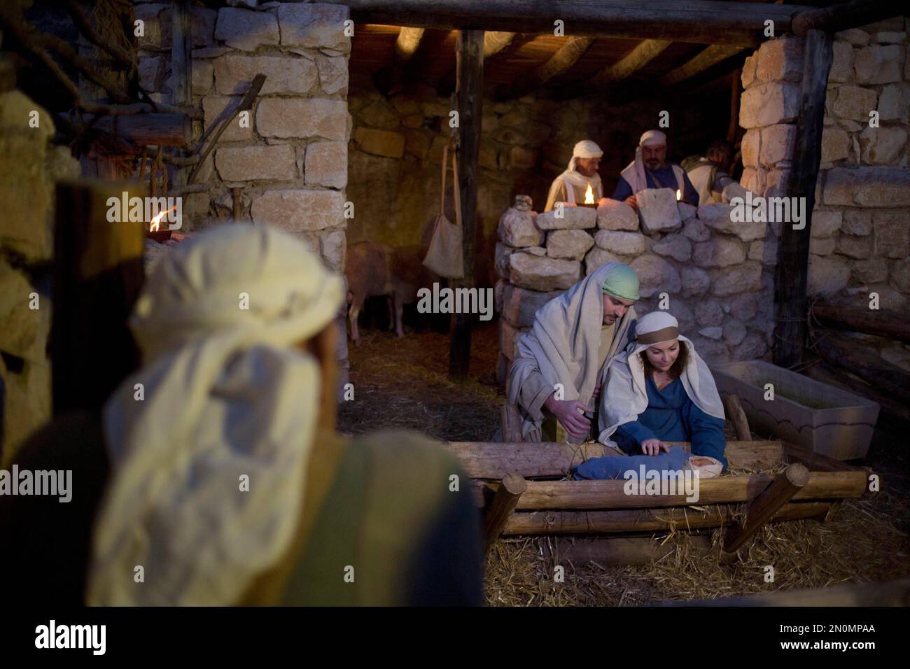 Christian actors play the parts of Joseph and Mary during a re ...