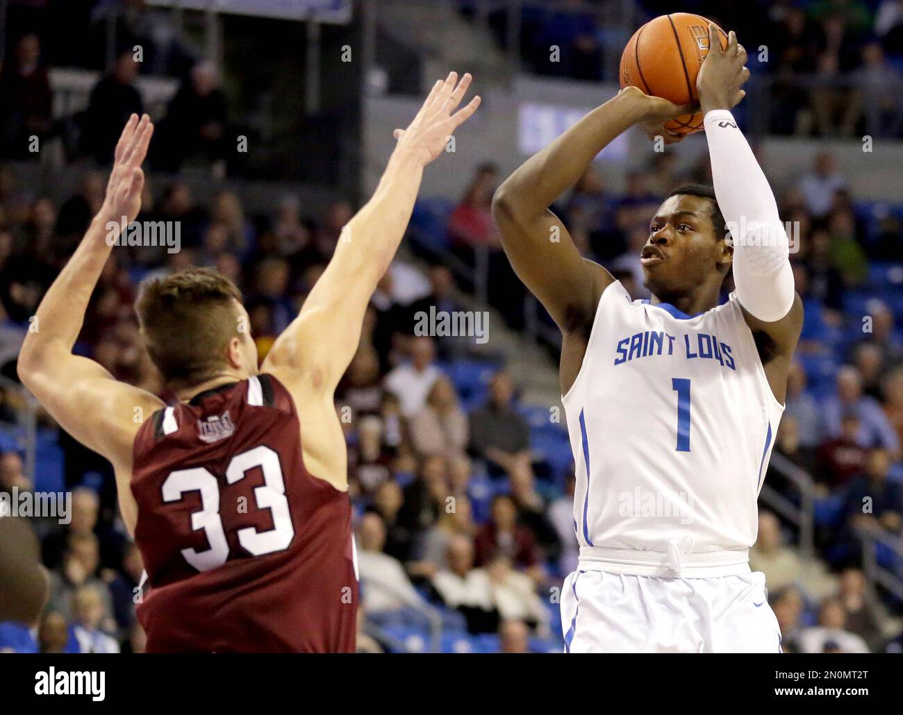 Saint Louis' Milik Yarbrough, right, shoots over Southern Illinois ...
