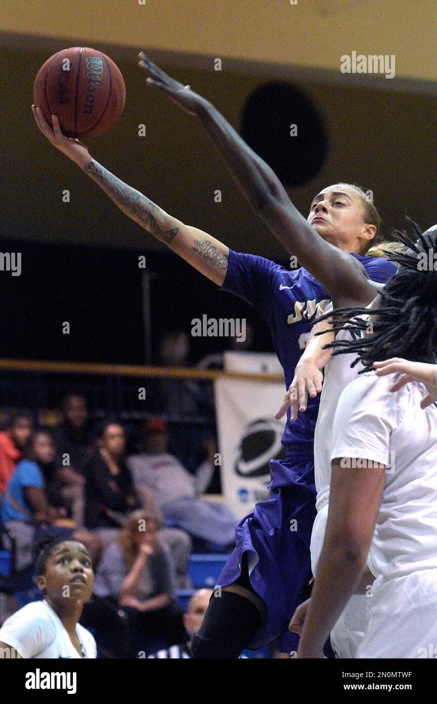 James Madison guard Jazmon Gwathmey goes up for a shot during the ...