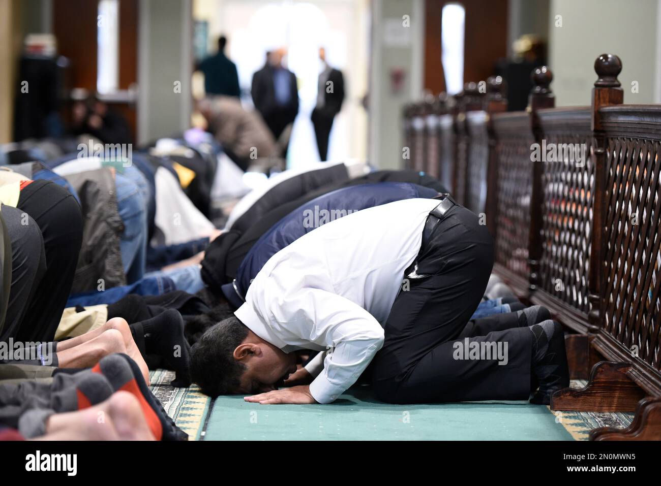 Muslim men pray at the All Dulles Area Muslim Society (ADAMS) Center in ...
