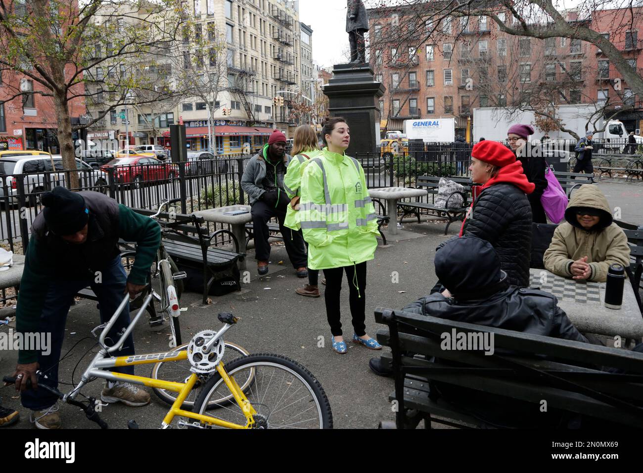 Allison McCullough, center, talks with a homeless woman in Tompkins ...