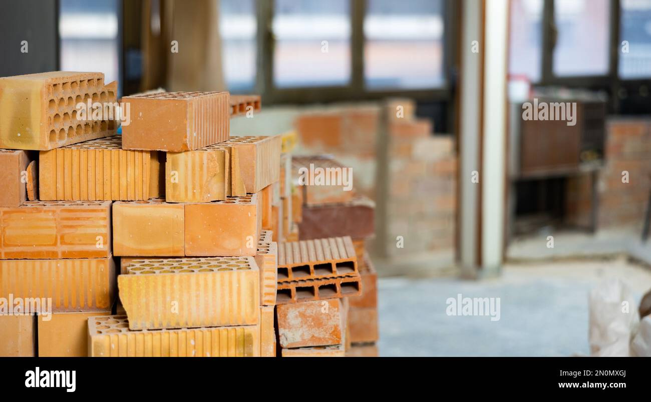Bricks and materials for renovation in house Stock Photo - Alamy