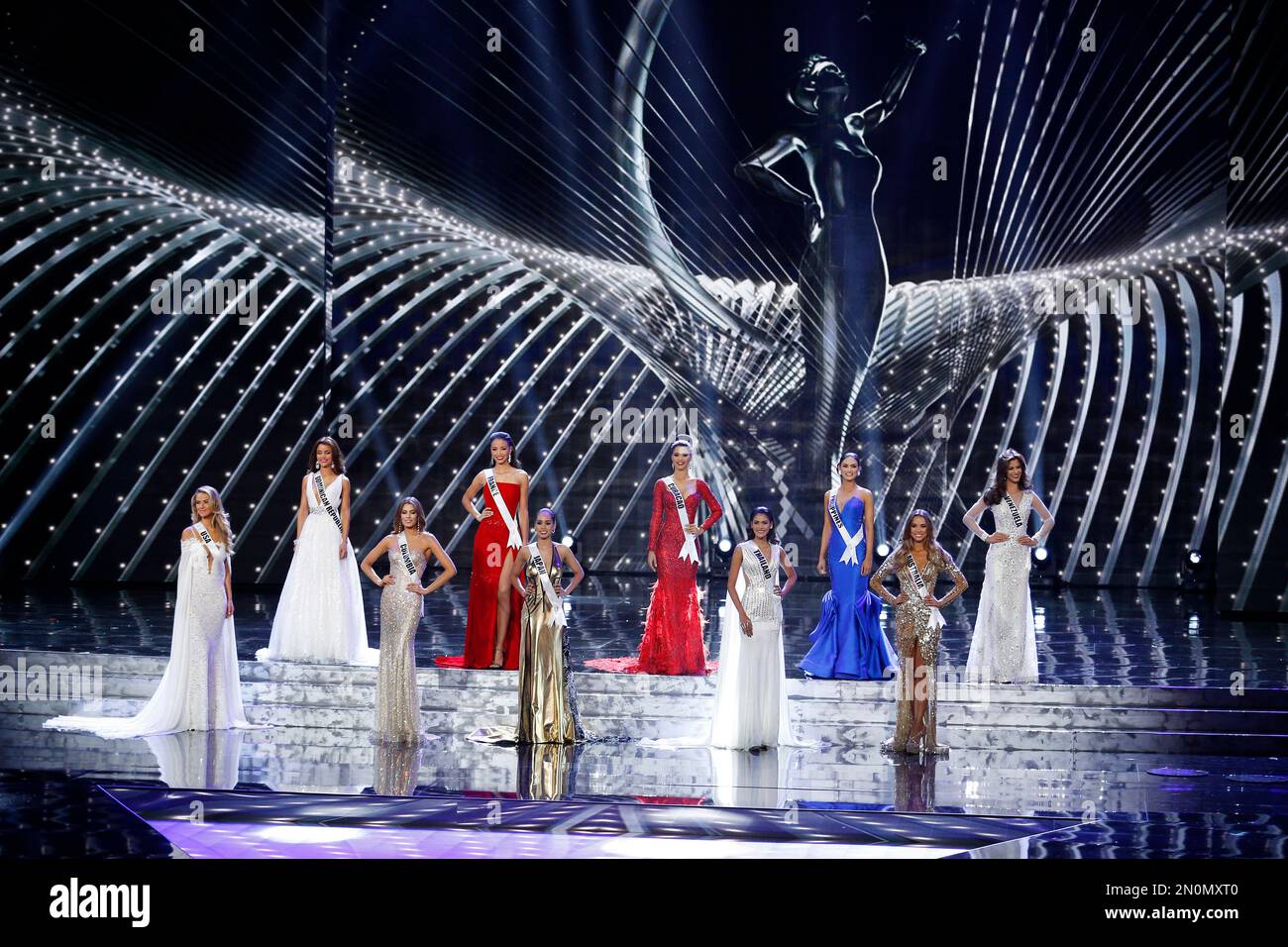 Contestants stand on stage at the Miss Universe pageant Sunday, Dec. 20 ...