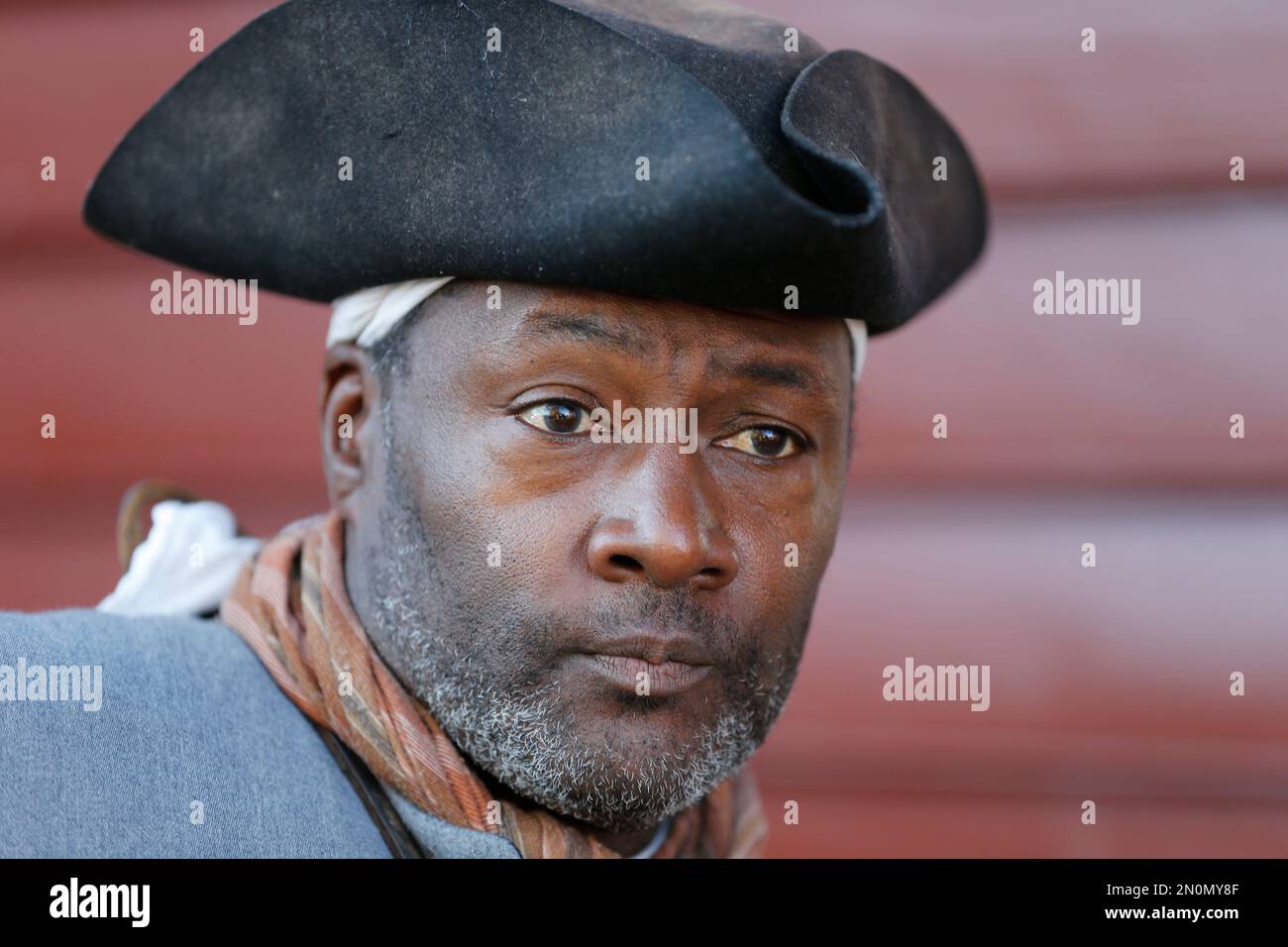 Historical interpreters Robert Watson Jr., talks with a fellow ...