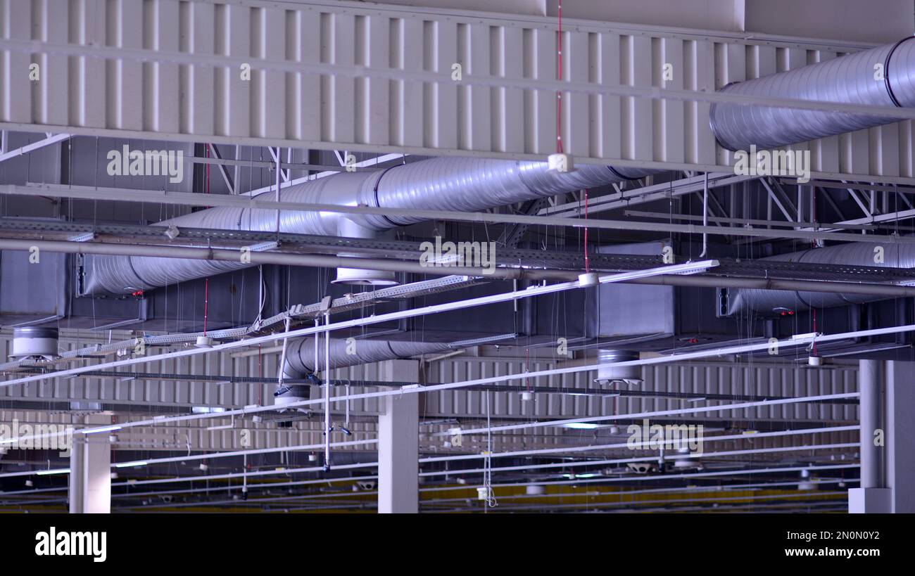 Lights and ventilation system on ceiling of the supermarket hall ...